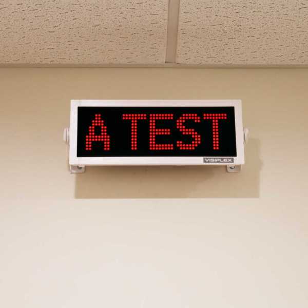 Wireless Message Board for text messaging and digital time display